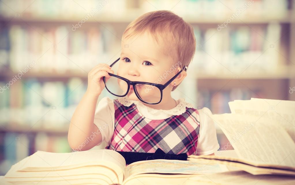 Baby Reading With Glasses