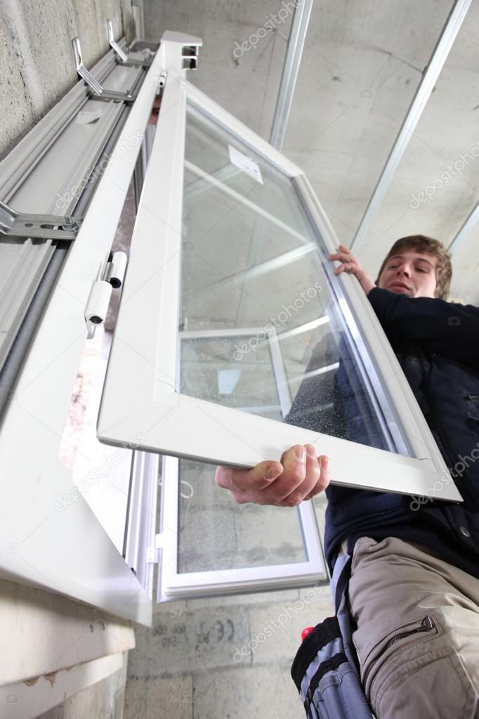 Man fitting a window — Stock Photo © photography33 #13831504