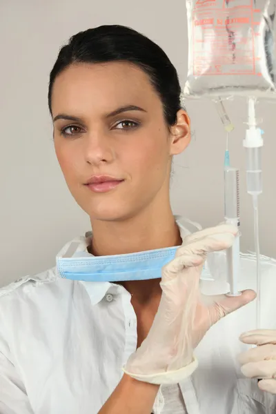 Doctor hooking up an IV Stock Photo by ©photography33 10515907