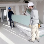 Two workers installing window Stock Photo by ©kalinovsky 42221009