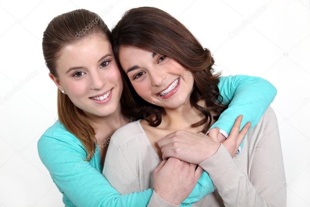 Two young women in a friendly hug — Stock Photo © photography33 #16019913