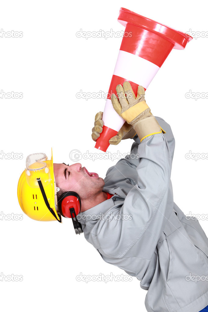 Angry tradesman yelling into a megaphone — Stock Photo © photography33 ...