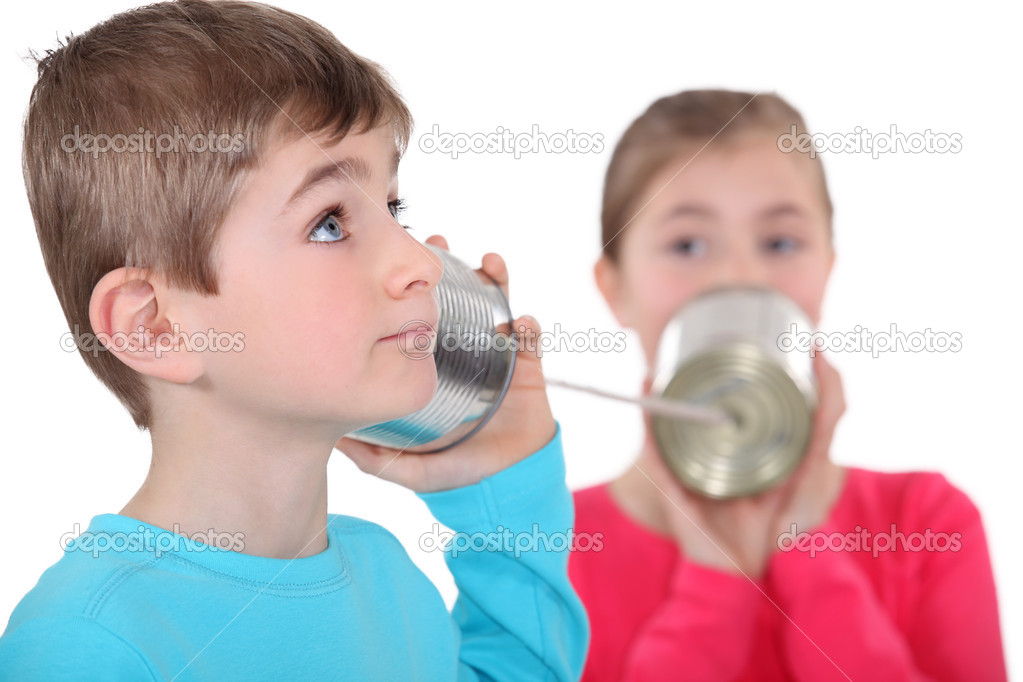 Brother and sister communication via sting and tin Stock Photo by ...