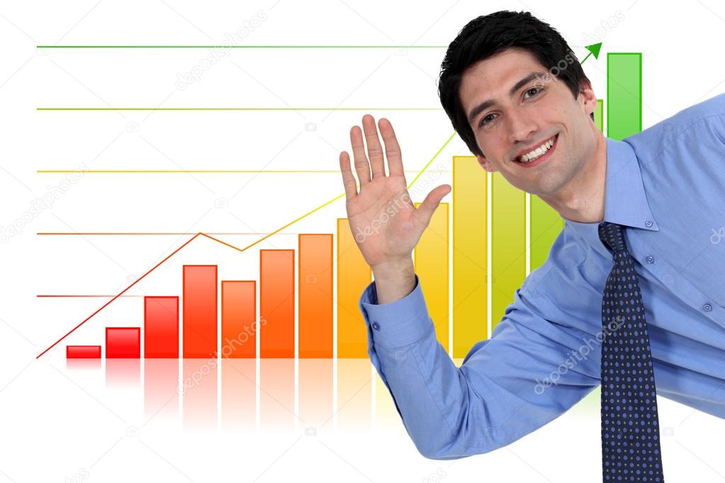 Businessman waving in front of bar chart — Stock Photo © photography33 ...