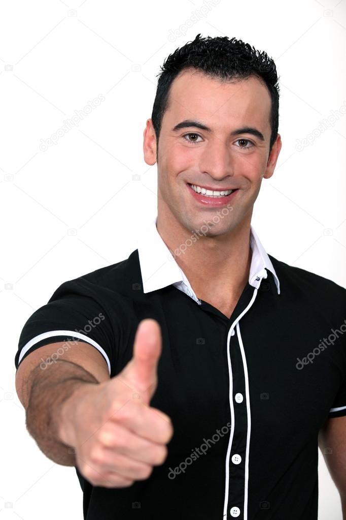 Man making a thumbs up sign — Stock Photo © photography33 #17055097