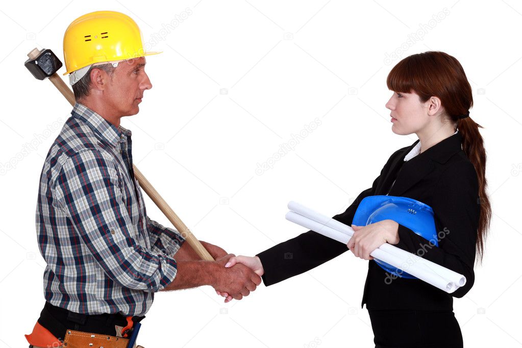 Polite architect and builder greeting each other — Stock Photo ...