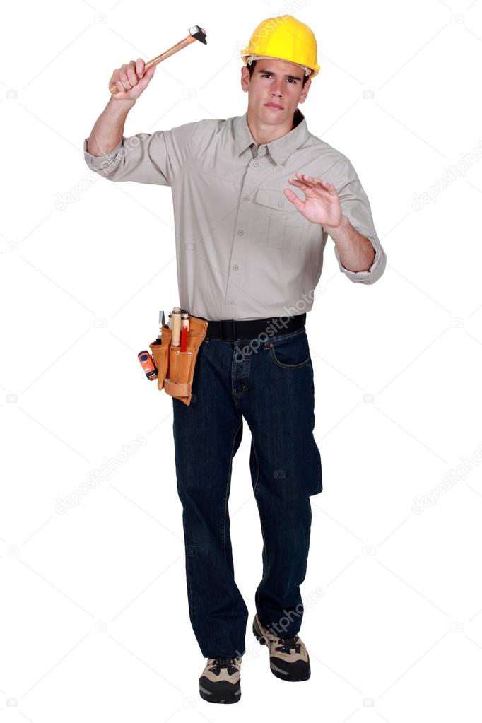 Craftsman striking with a hammer Stock Photo by ©photography33 17380453