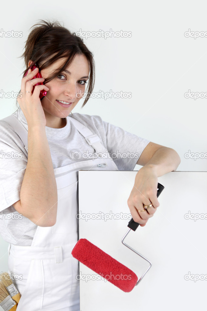 Female decorator stood by blank panel — Stock Photo © photography33 ...