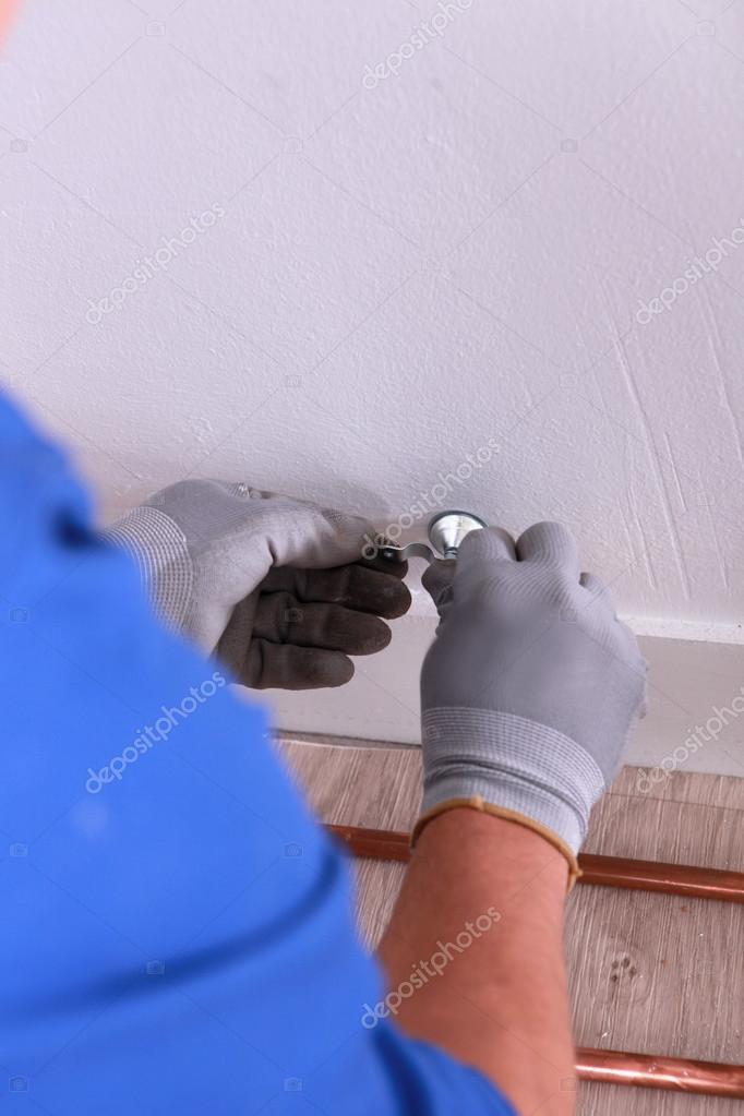 Plumber fixing copper pipe wall ⬇ Stock Photo, Image by © photography33 ...