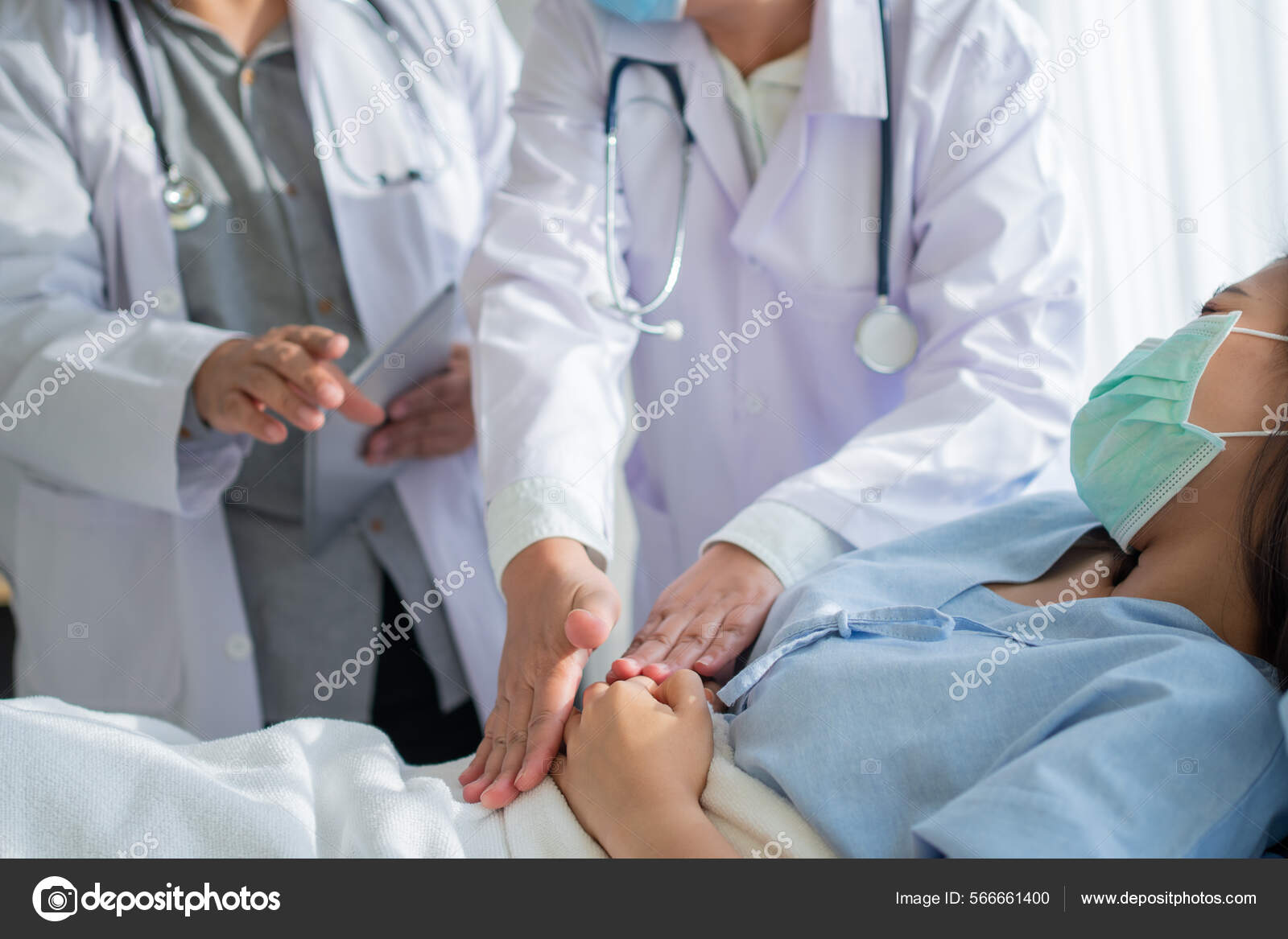 Group Doctor Try Help Patient Woman Lie Hospital Bed Holding Stock ...
