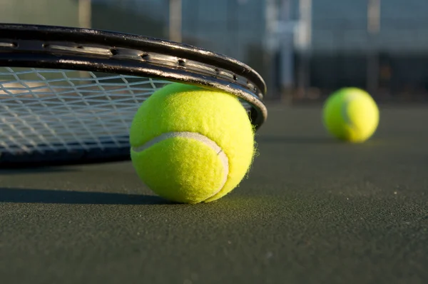 Tennis Ball and Racket Stock Photo by ©33ft 10697940