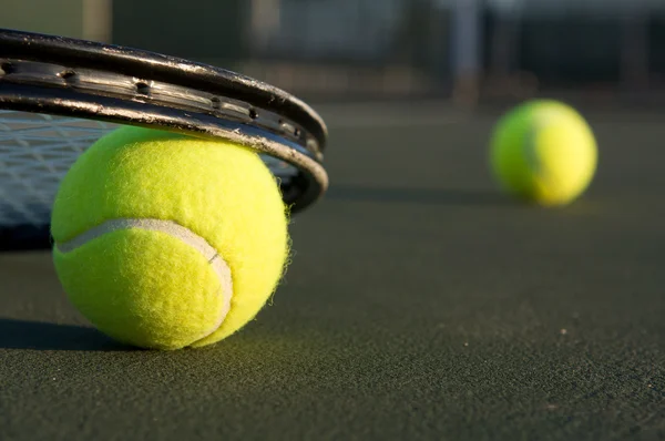 Tennis Ball and Racket Stock Photo by ©33ft 10697940