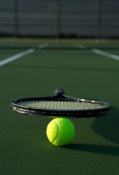 Tennis Ball and Racket Stock Photo by ©33ft 12627656