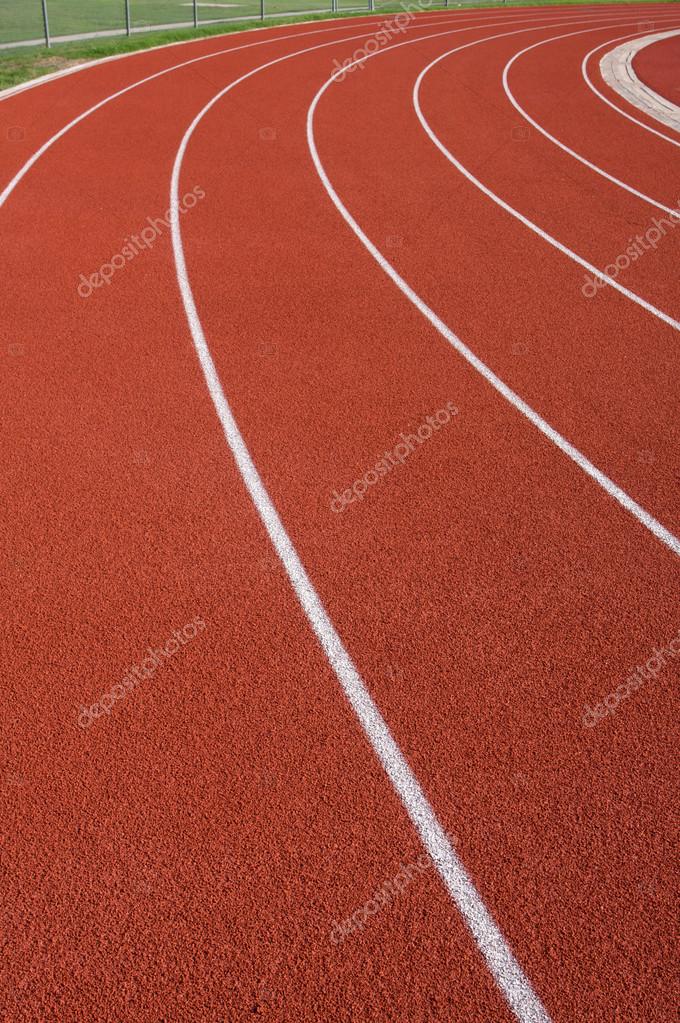 Curve of a Red Running Track Stock Photo by ©33ft 35702017