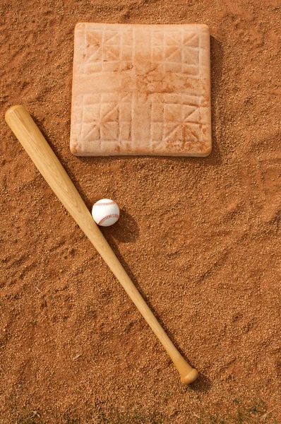 Baseball & Bat near the base Stock Photo by ©33ft 6926269