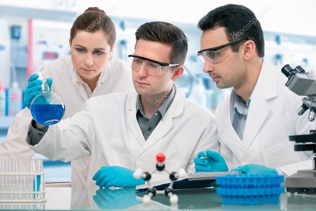 Scientists experimentation in research laboratory — Stock Photo ... Scientists experimentation in research laboratory — Stock Photo ...
