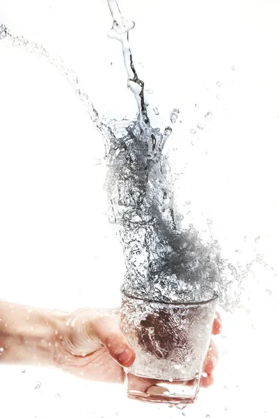 Holding cups, splashing water — Stock Photo © katemlk023 #13918143
