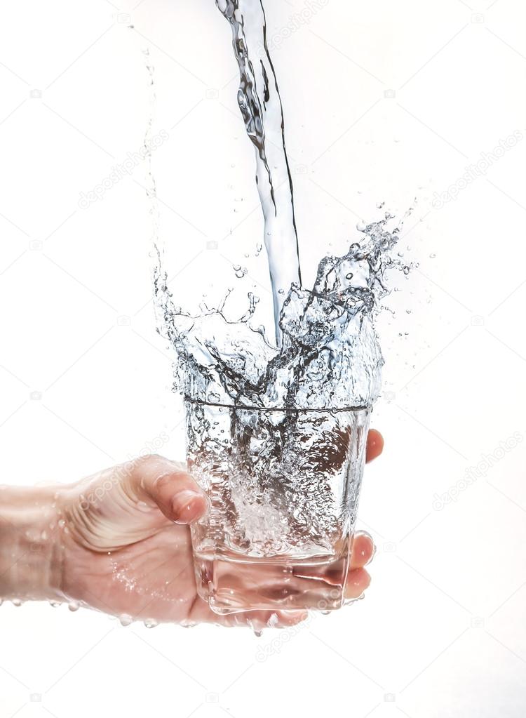 Holding cups, splashing water — Stock Photo © katemlk023 #13918143