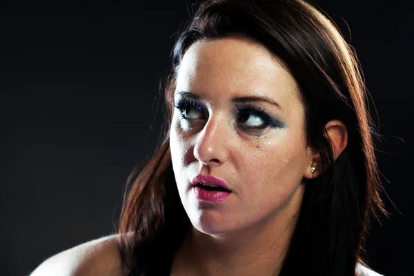 Hurt woman crying, smeared makeup Stock Photo by ©leszekglasner 46118941