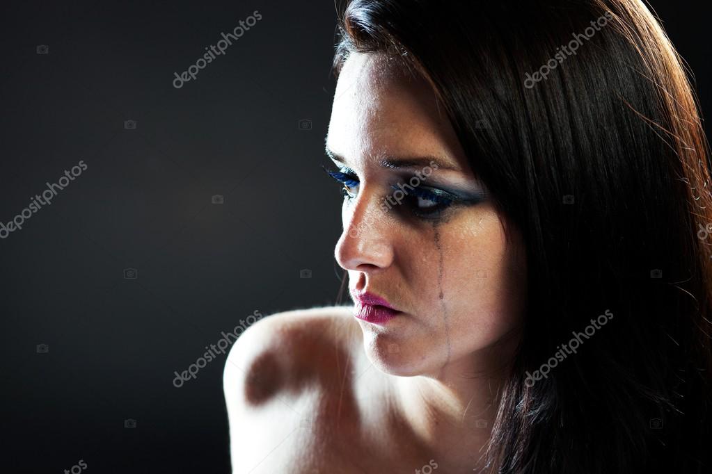 Hurt woman crying, smeared makeup Stock Photo by ©leszekglasner 46118941