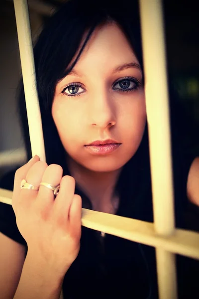 Woman behind the bars — Stock Photo © muro #81199018