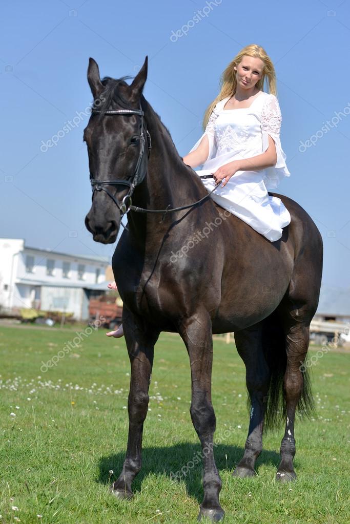 Bride ridding a horse. Stock Photo by ©muro 43853785