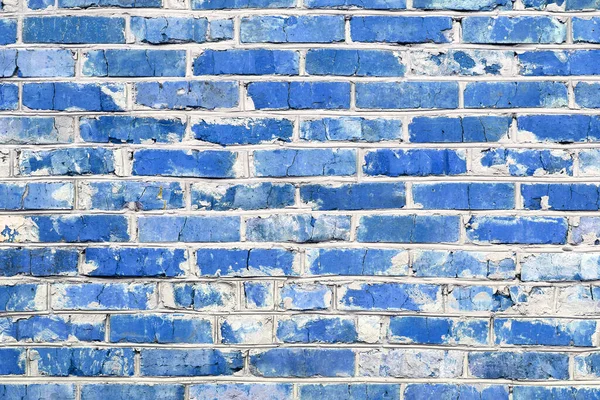 Brick wall with unusual blue bricks made of whole blue bricks and ...