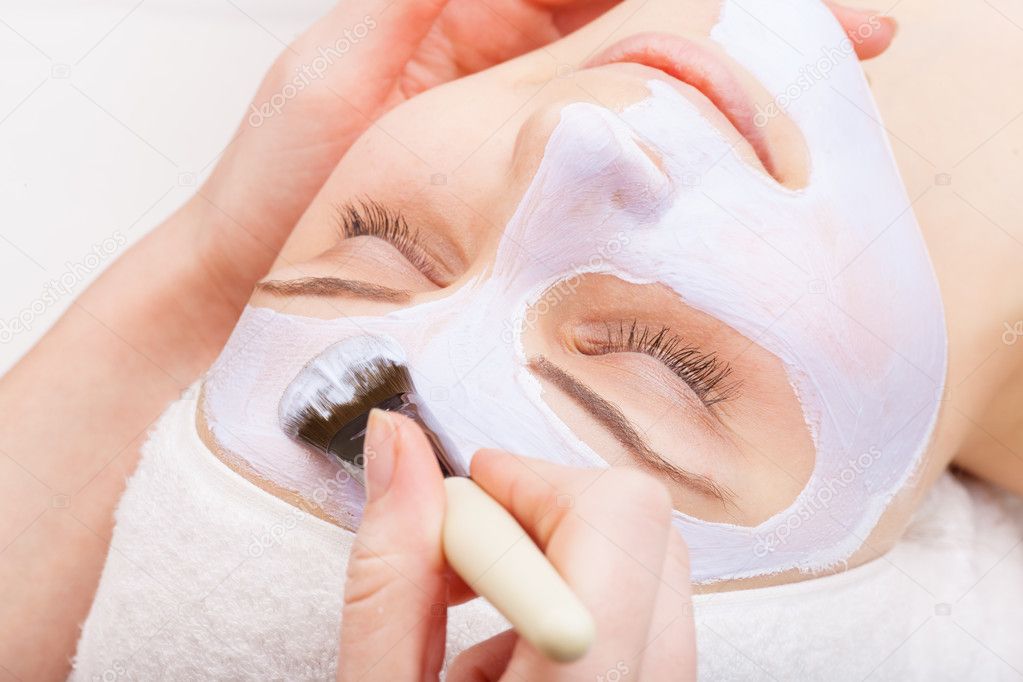 Applying facial mask Stock Photo by ©artem_furman 17460481