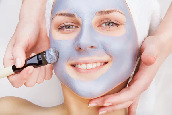 Applying facial mask Stock Photo by ©artem_furman 17460481