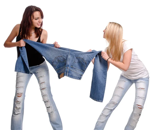 Two teenagers fighting over jeans Stock Photo by ©Vaicheslav 16437809