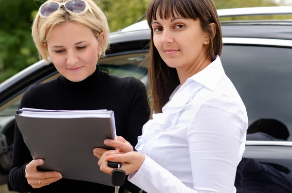 New owner purchasing a car - Stock Image - Everypixel