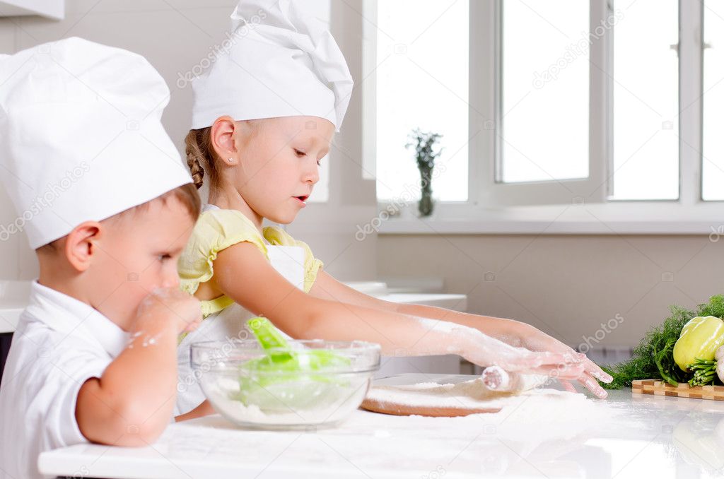Teamwork in the kitchen Stock Photo by ©ampack 50430011