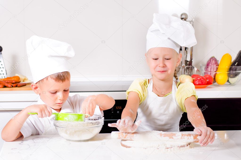 Teamwork in the kitchen Stock Photo by ©ampack 50430017