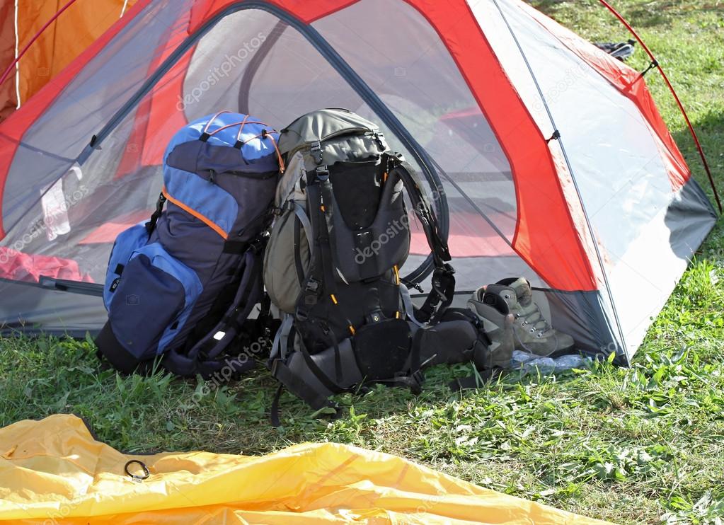 Backpacks of hikers resting above the tent — Stock Photo © ChiccoDodiFC ...