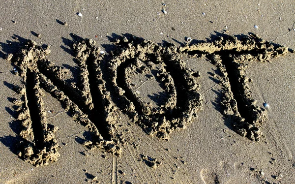 Check mark in the sand Stock Photo by ©Bigandt 51865975