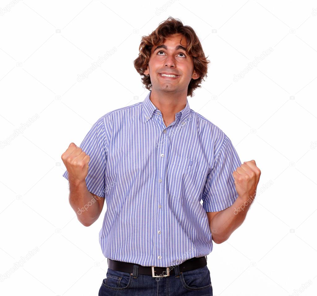 A happy man, smiling and celebrates winning. Stock Photo by ...