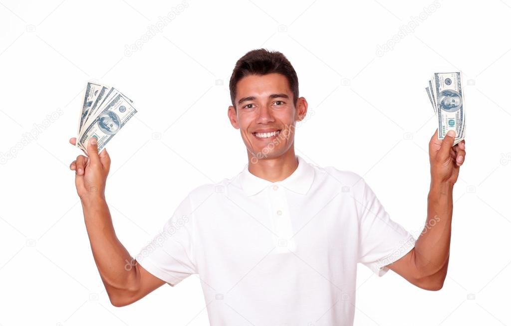 Ambitious man smiling with cash on hands. — Stock Photo © pablocalvog ...