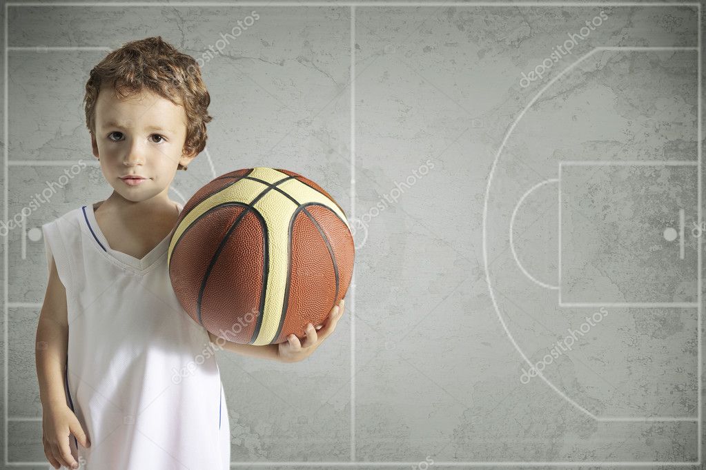 Download - Little boy with basket ball over court background — Stock Image