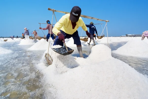 Salt farming in Thailand — Stock Editorial Photo © gnomeandi #51302471