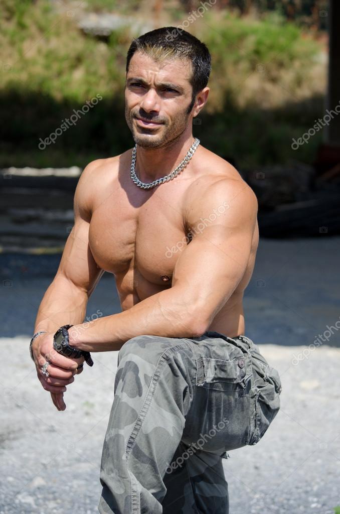 Muscular construction worker shirtless in building site — Stock Photo ...
