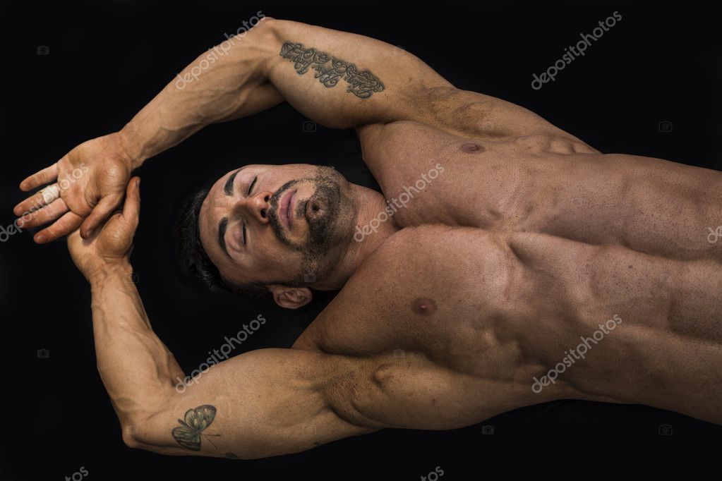 Attractive young muscle man laying on the floor — Stock Photo ...