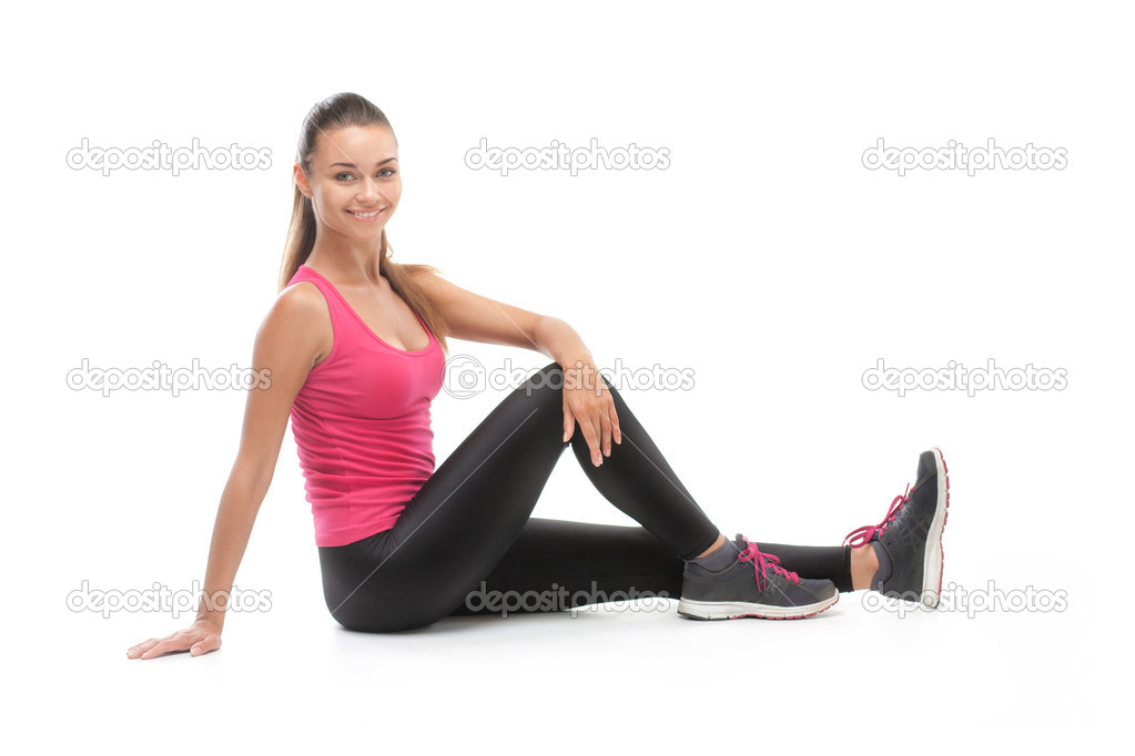Smiling beautiful woman doing exercise — Stock Photo © doodko #32705957