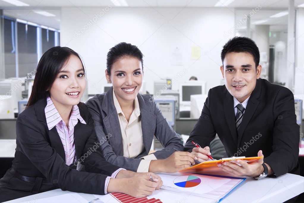 Asian business team at a meeting Stock Photo by ©realinemedia 31230085