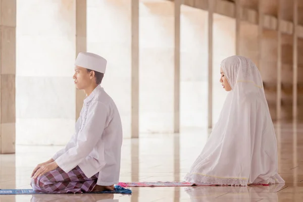 Muslim Husband And Wife Praying