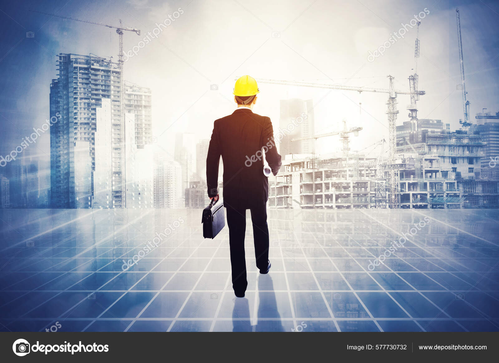 Back View Male Engineer Holding Blueprint While Walking Construction ...
