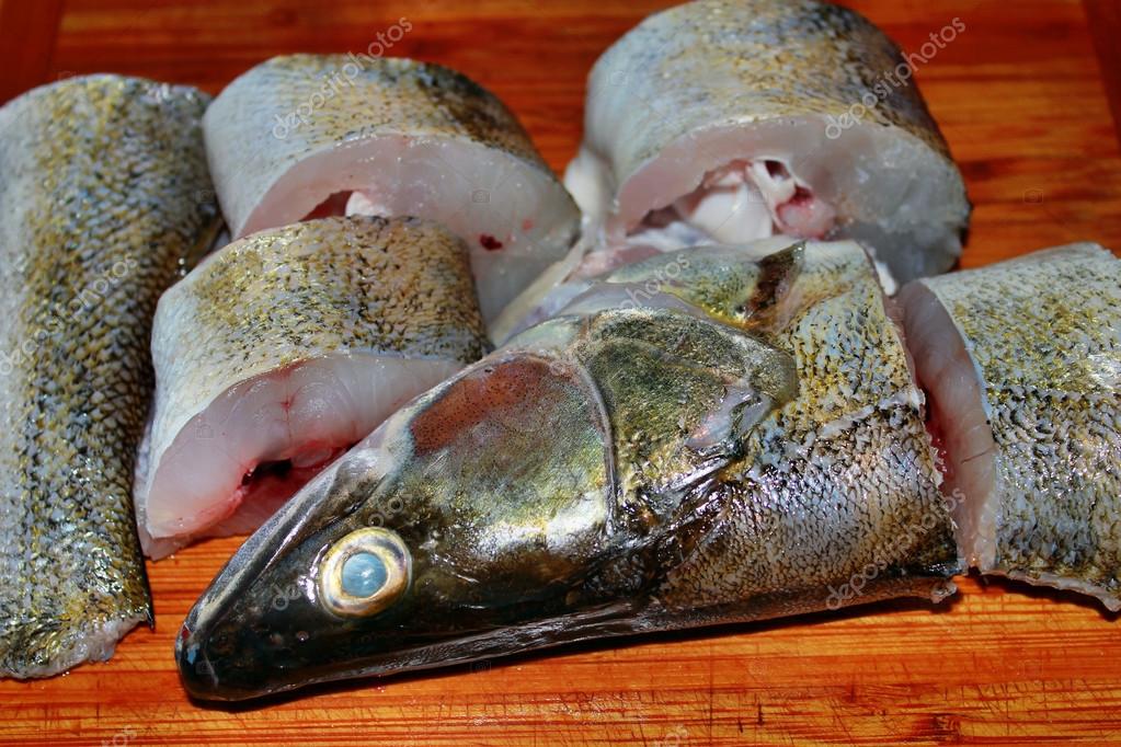 Pieces of fresh fish on a cutting board — Stock Photo © yli9445yli9445 ...