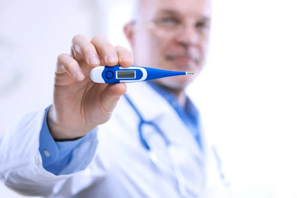 Doctor Taking Patient's Temperature Using Digital Thermometer Patient ...