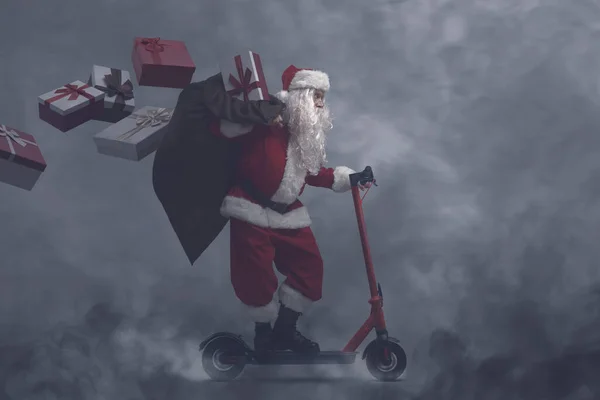 Santa en un scooter Stock Photos, Royalty Free Santa en un scooter ...