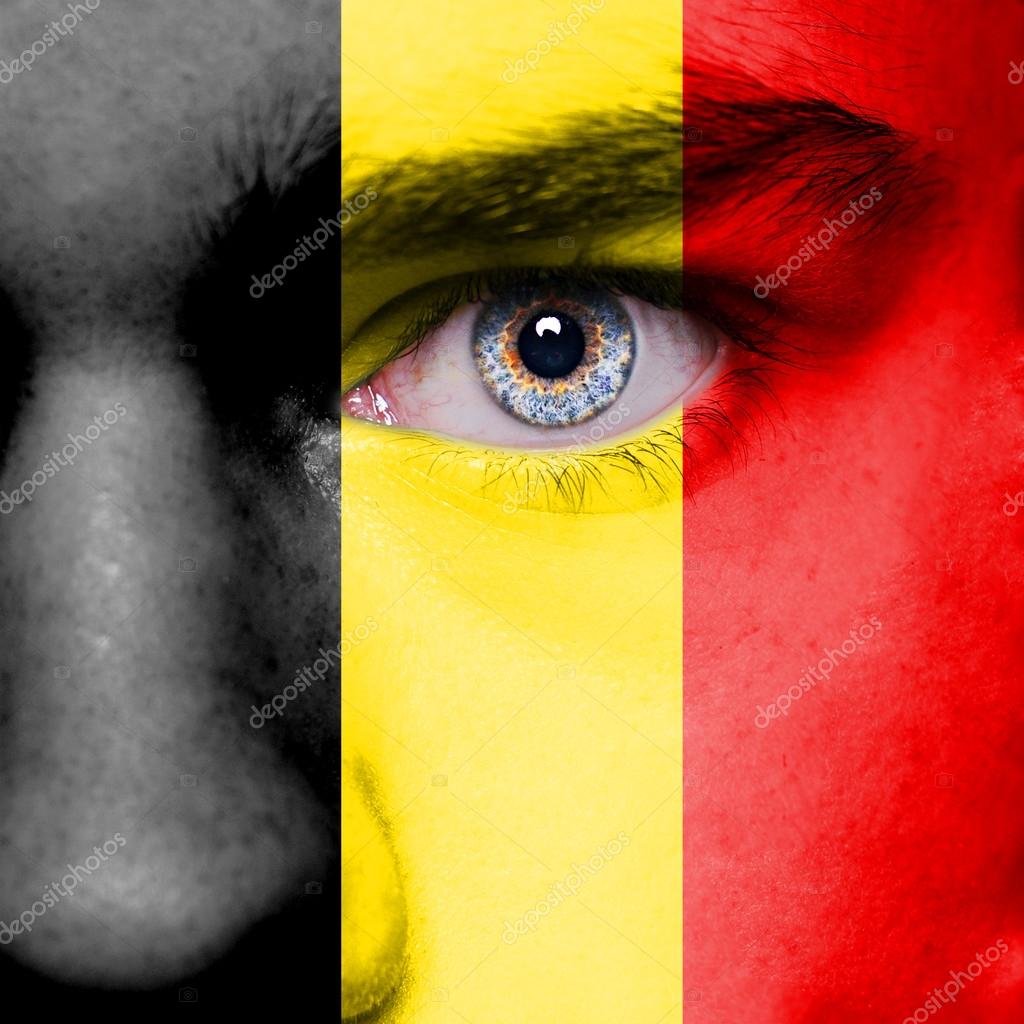 Belgium flag painted on face Stock Photo by ©kwasny222 28546709