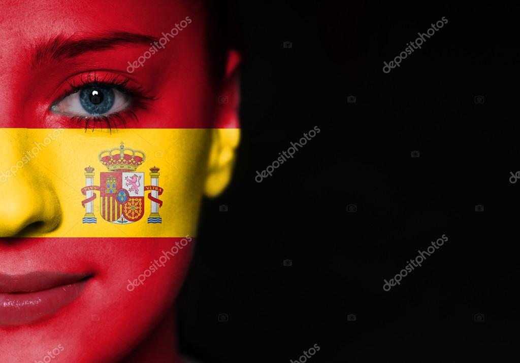 Painted woman face with flag of Spain Stock Photo by ©kwasny222 28549821